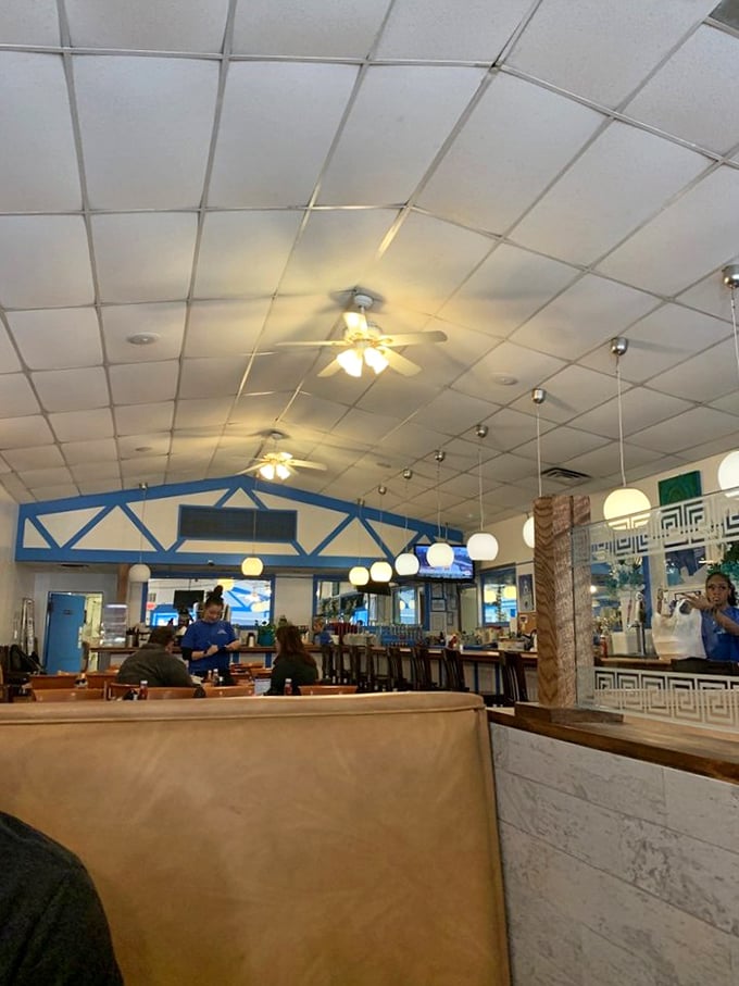 The dining room hums with conversation and clinking glasses – where regulars become friends and first-timers become regulars.