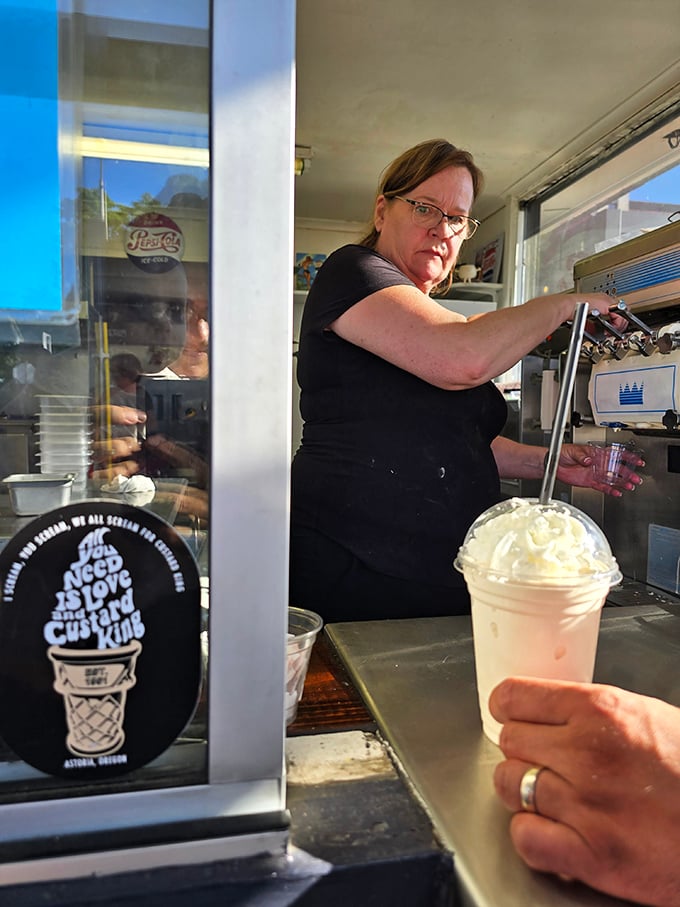 The custard artisan at work, transforming simple ingredients into creamy masterpieces that keep locals coming back for decades.