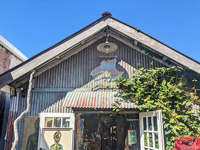 The Copper Column's weathered metal exterior houses treasures that tell stories—the kind of place where one person's castoff becomes another's conversation piece.