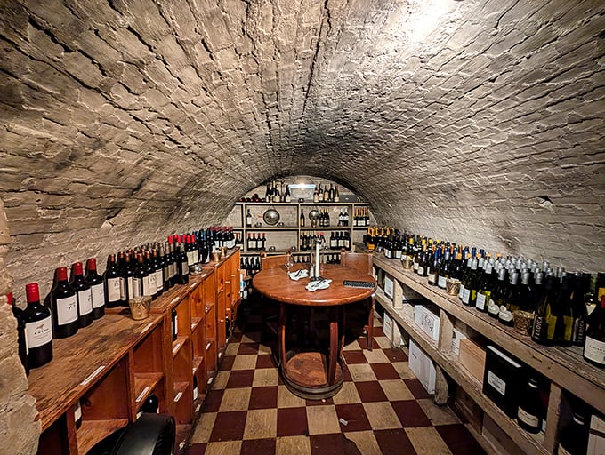 A wine cellar worthy of a treasure map—brick arches housing bottles that range from "special occasion" to "selling a kidney to afford this."