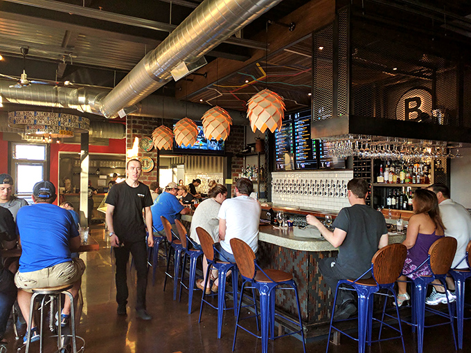 The bar scene at Bahnhof buzzes with energy as patrons experience the age-old tradition of solving the world's problems over excellent beer.