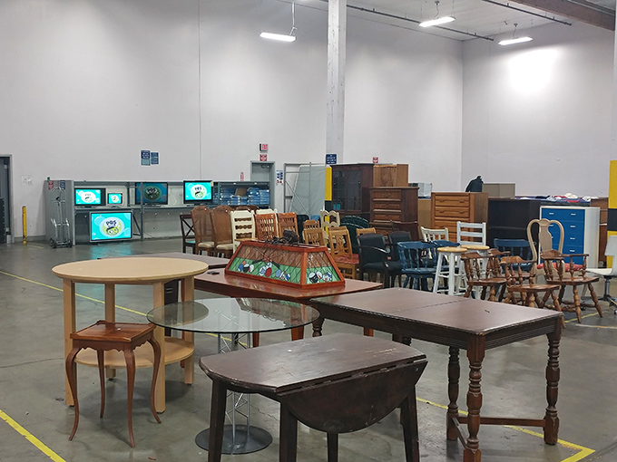 Furniture island – where dining tables from different decades come to meet. That drop-leaf beauty on the left has hosted countless family dinners.