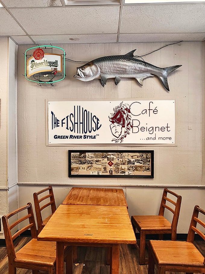 The fish on the wall isn't judging your order—it's jealous. Nautical décor that feels earned, not manufactured.