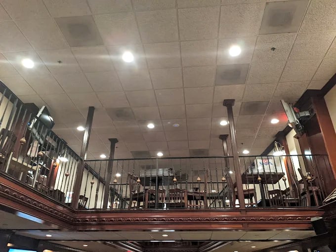 From this mezzanine perch, you can survey the dining room like a benevolent seafood monarch, planning your next delicious conquest.