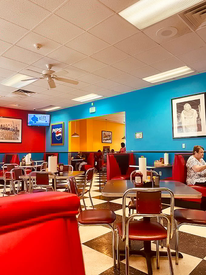 Bold colors, classic diner chairs, and the promise of good eating. The blue and red color scheme isn't just patriotic—it's appetizing.