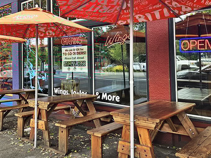 Those outdoor picnic tables under bright orange umbrellas? They're where summer memories are made, one crispy chicken bite at a time.