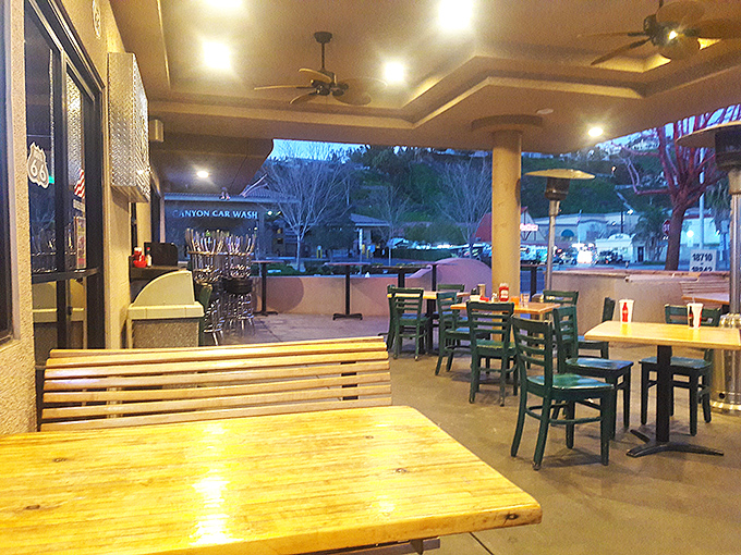 The outdoor patio offers Route 66 vibes with modern-day comfort. Those turquoise chairs wouldn't look out of place at a roadside stop circa 1962.