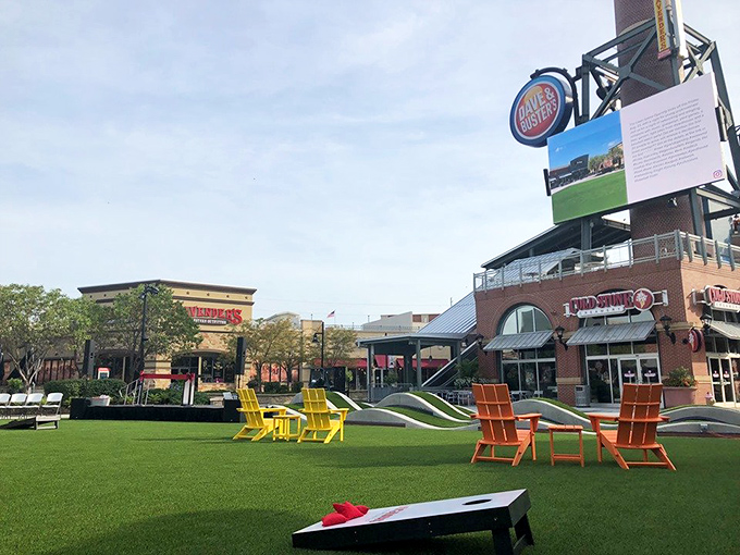 Colorful Adirondack chairs invite weary shoppers to take five while contemplating life's important questions—like "Can I fit another shopping bag in my car?"