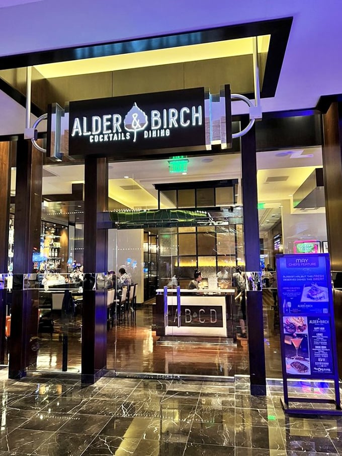 Alder & Birch's modern entrance gleams like a temple dedicated to the art of perfect steak.