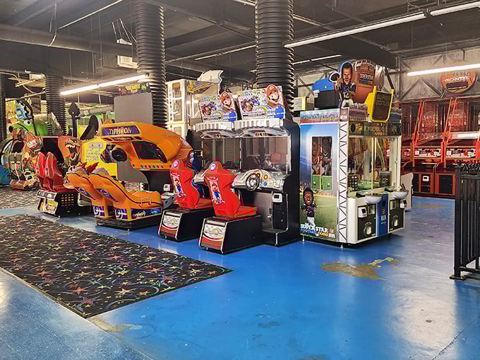The arcade beckons with flashing lights and nostalgic racing games – where parents suddenly remember skills they haven't used since the Clinton administration.