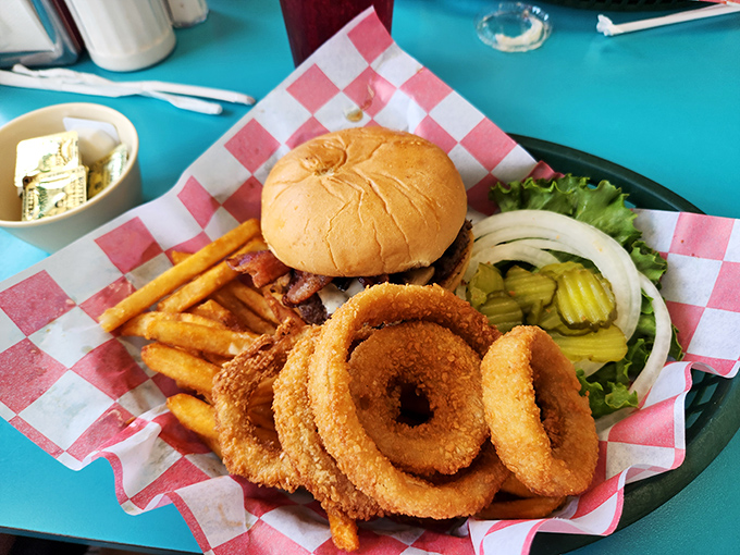 This isn't just a burger—it's lunch throwing down the gauntlet to breakfast's supremacy. Those onion rings are the perfect supporting cast.