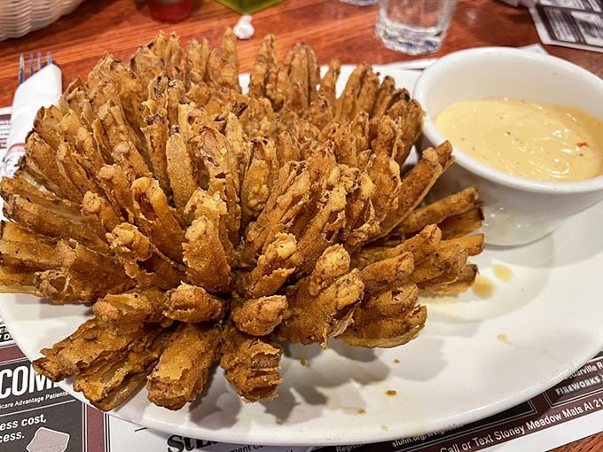 The Blooming Onion: a golden, crispy flower that makes vegetables exciting even to confirmed carnivores. Dipping sauce not optional.