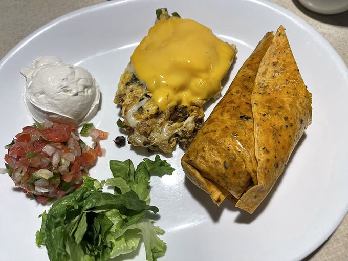 The breakfast burrito: all the morning essentials wrapped in one convenient tortilla package. It's like someone folded an entire diner menu into a portable feast.