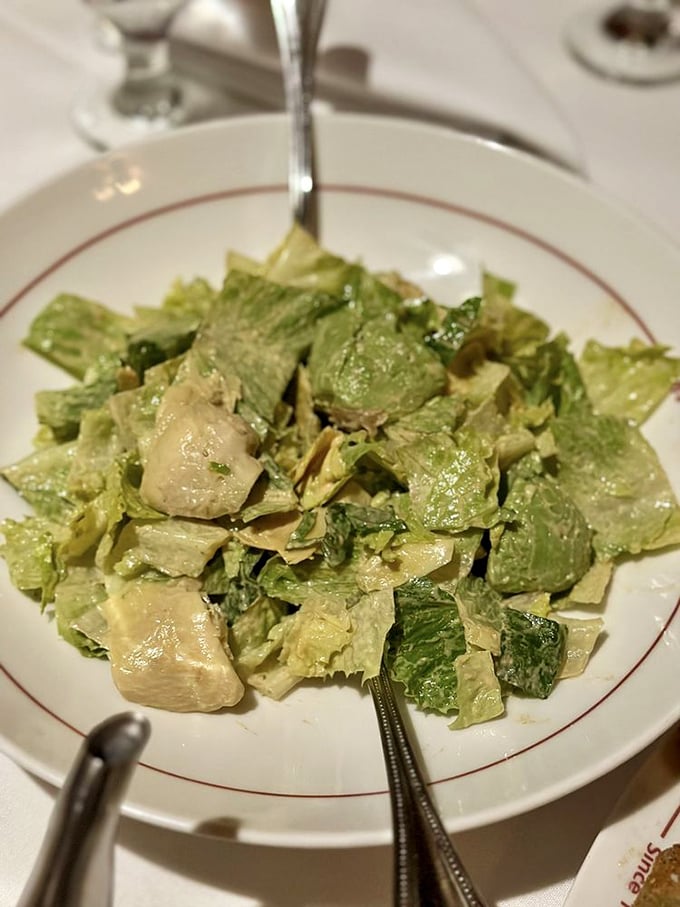 A proper Caesar salad—crisp, tangy, and unapologetically anchovy-forward, just as the food gods intended.
