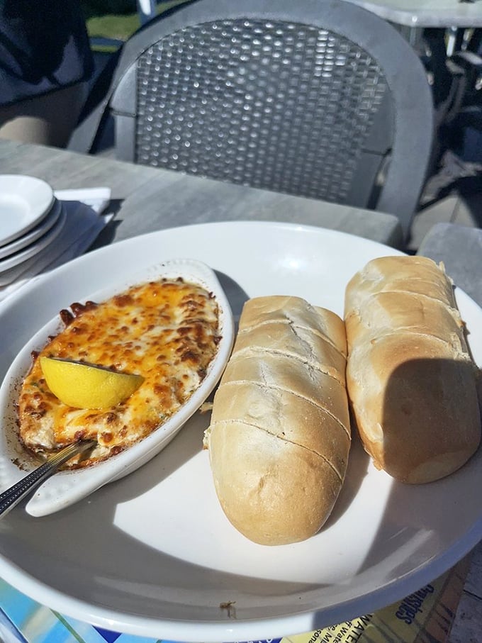 This bubbling crab dip with golden bread isn't just an appetizer—it's the Eastern Shore's most delicious welcome committee.