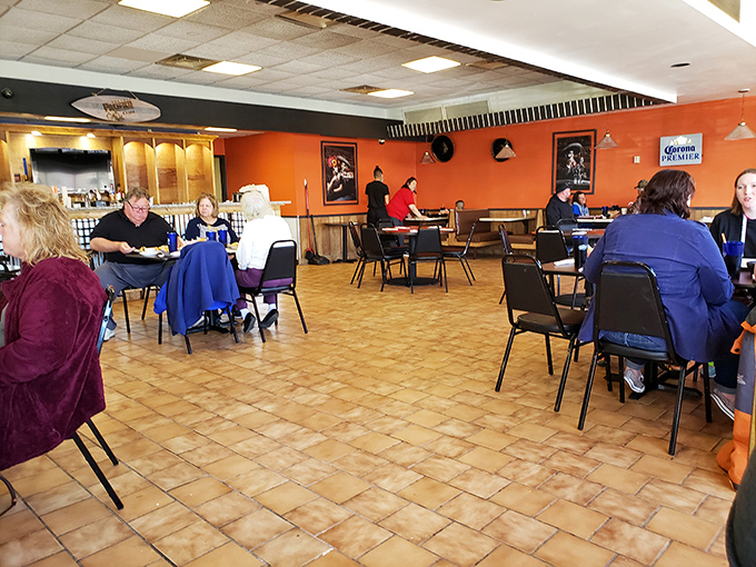 A dining room filled with happy customers—the universal sign of good food. Notice how nobody's looking at their phones? That's the El Charro effect.
