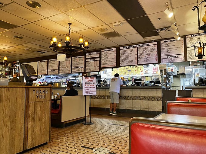 The ordering counter at Frontier – where decisions are made, numbers are taken, and culinary adventures begin.