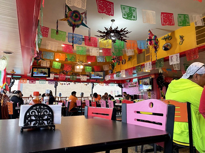 The colorful décor includes vintage photos and playful elements. Like walking into your most interesting friend's living room—if they served amazing tacos.