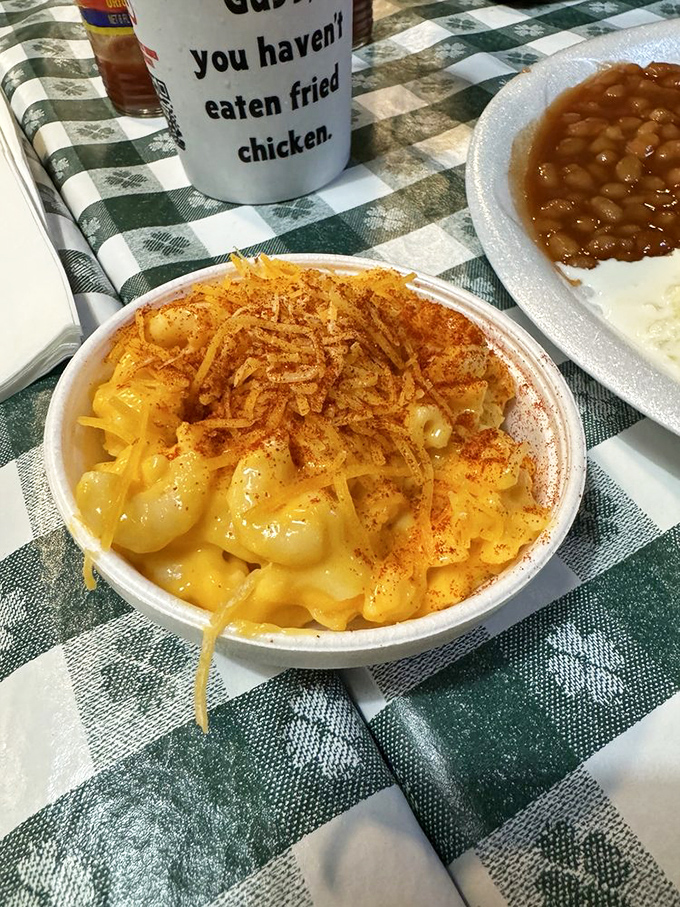 Mac & cheese topped with paprika and love—comfort food that's been elevated without getting fancy enough to forget its roots.