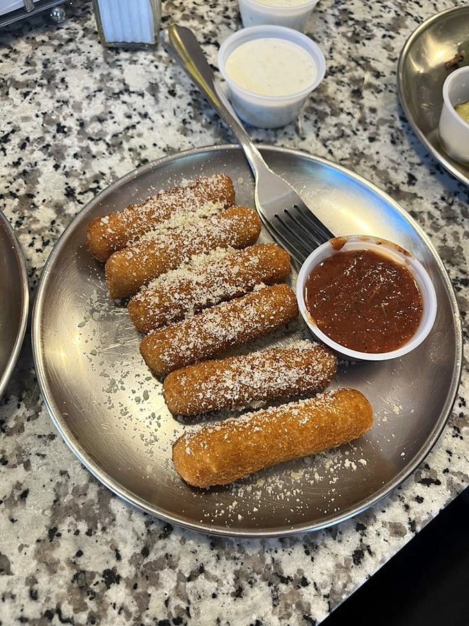 Cheese gets its moment in the spotlight. These golden-brown mozzarella sticks with marinara are the opening act to burger greatness.