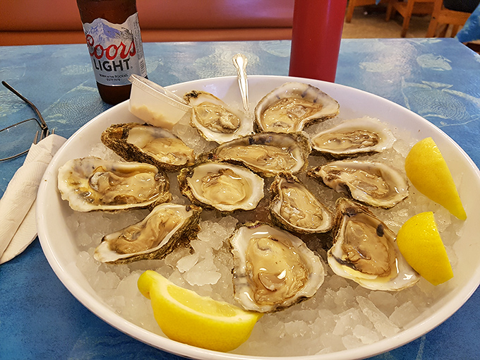 Oysters on the half shell, glistening like jewels on ice. Nature's perfect appetizer—just add lemon and momentarily forget you're in West Virginia.