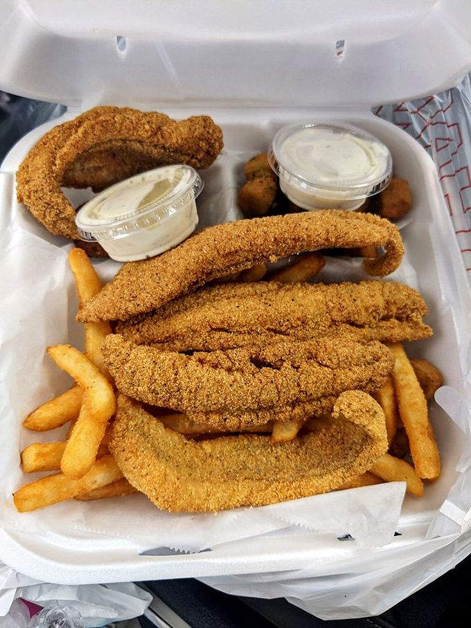 This isn't just fried catfish—it's Arkansas heritage served hot, crispy, and with all the proper fixings.