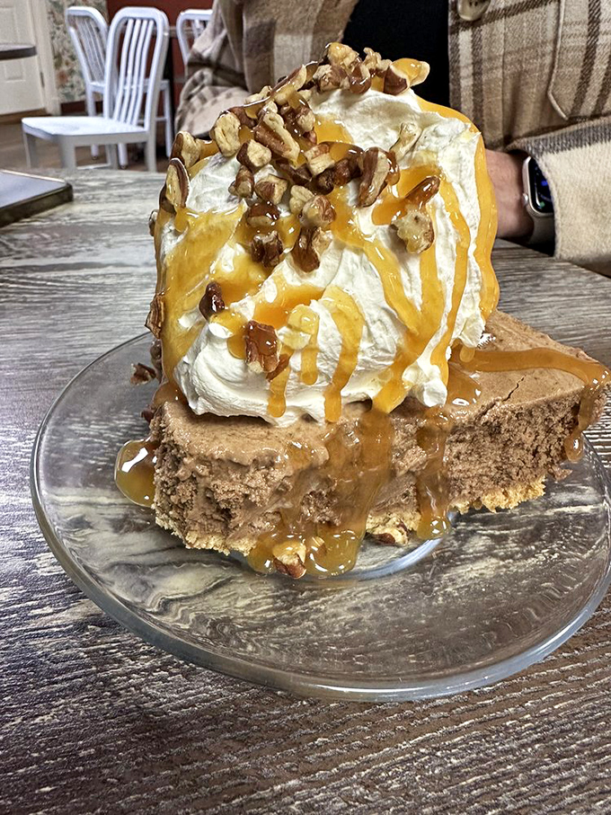 This turtle cheesecake doesn't just have caramel, pecans, and whipped cream—it has ambition, engineering, and absolutely no restraint.
