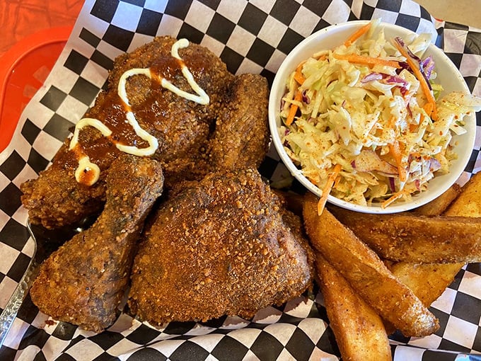 This isn't just a meal, it's a masterclass in texture—crispy chicken, creamy slaw, and those jo-jos that somehow manage to be both fluffy and crunchy.