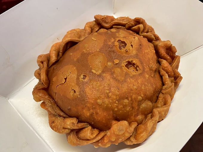 Not just a pie – a golden-brown fortress protecting a treasure of savory filling. Breaking that crust is a moment of pure anticipation.