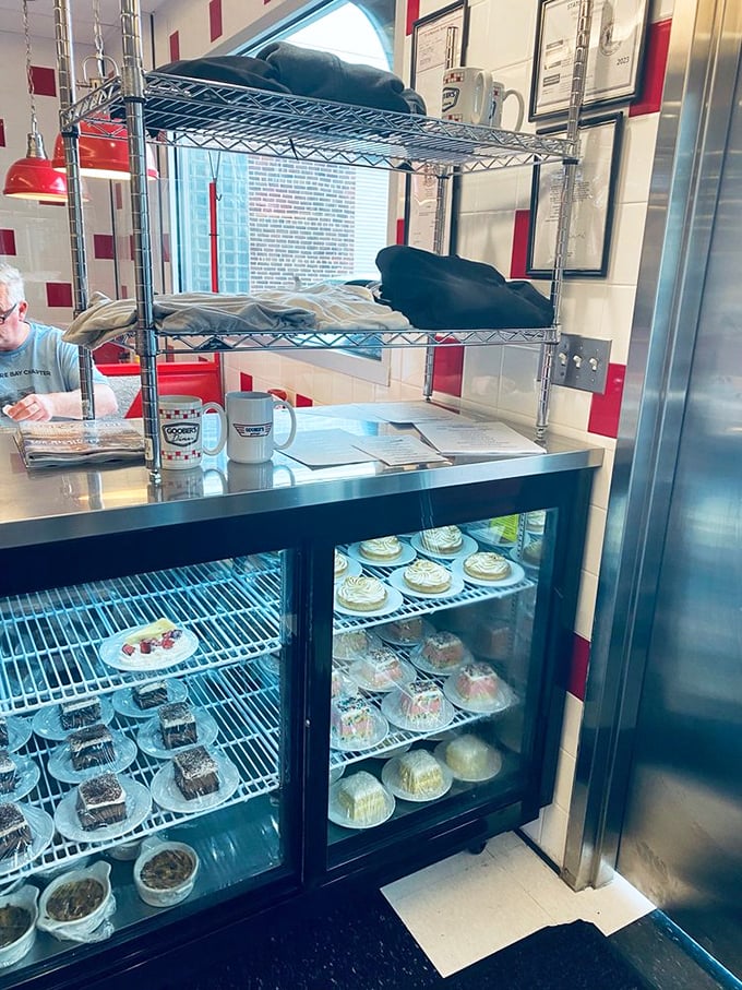 The dessert case—Delaware's version of the Louvre. Each shelf showcases edible art that somehow looks both meticulously crafted and comfortingly homemade.