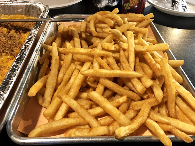 French fries done right: crispy outside, fluffy inside, and plentiful enough to share (though you probably won't want to). The perfect vehicle for any leftover sauce.