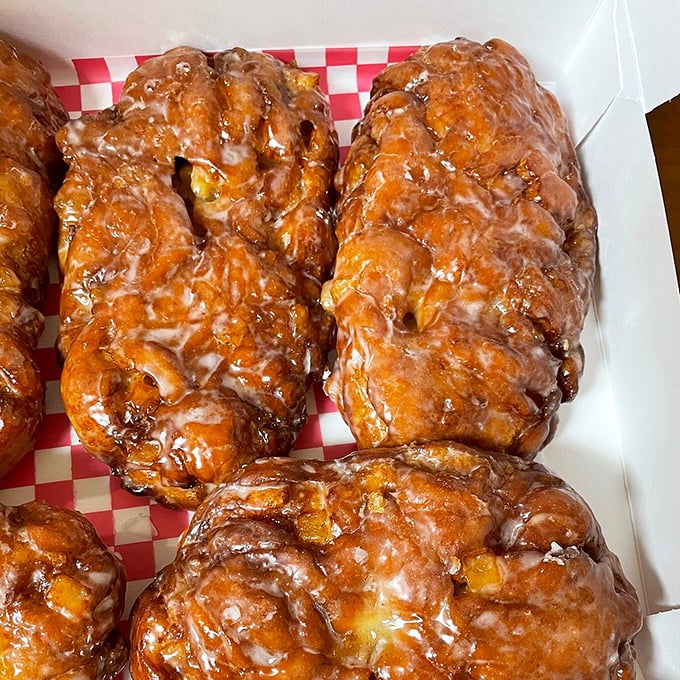 These apple fritters aren't just big—they're "you might want to notify your cardiologist" big. Worth every delicious bite.