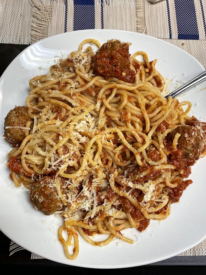 Spaghetti and meatballs—the classic reimagined. Those perfectly twirled noodles support meatballs that deserve their own fan club.