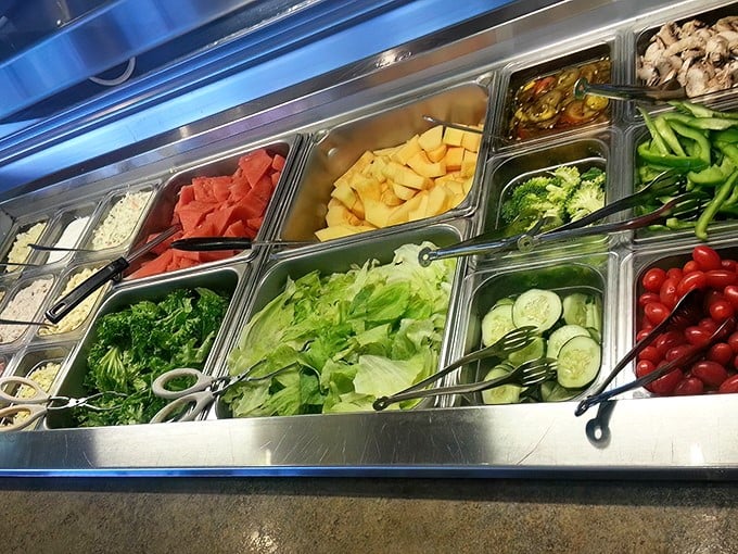 The salad bar—nature's apology for all the pie you're about to eat. Fresh, colorful, and completely optional.