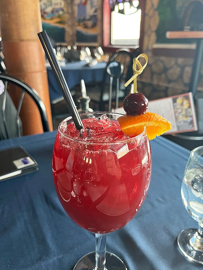 A sangria so vibrant it looks like it's auditioning for a starring role in your vacation memories. The cherry and orange slice seal the deal.