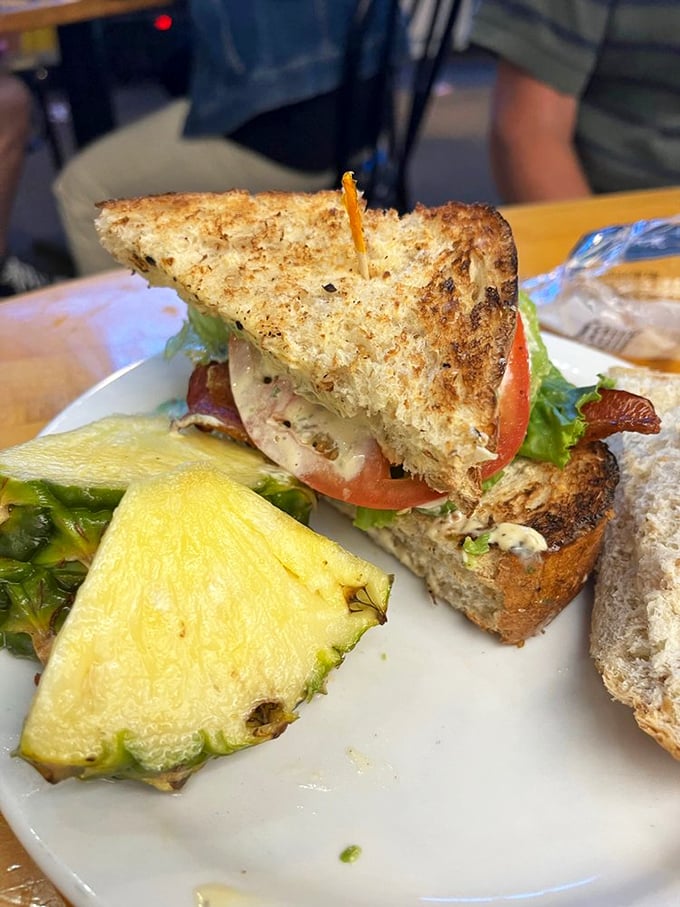 This sandwich stands as evidence that the BLT needed avocado all along—a culinary correction we should all be thankful for.