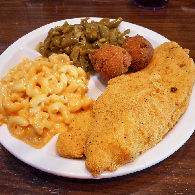 Cornmeal-crusted catfish that would make Mississippi jealous, flanked by mac and cheese that requires no gourmet reinvention. This is perfection, unfiltered.