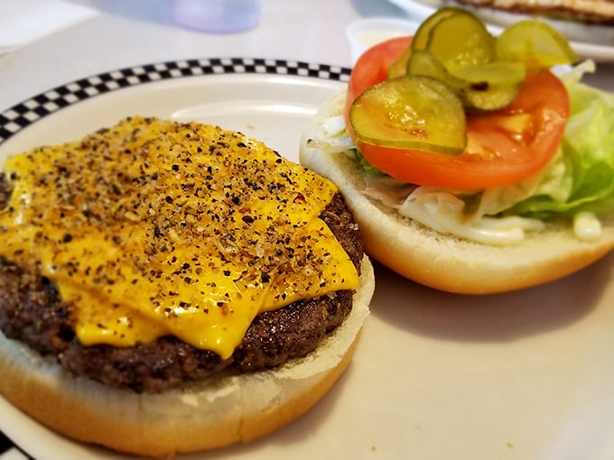 This isn't just a cheeseburger—it's proof that Rock-Cola's talents extend beyond breakfast. That melted cheese is clinging to the patty like it's afraid of falling off.
