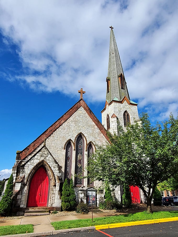 This stone church with striking red doors isn't just a place of worship—it's a testament to the craftsmanship that defines Bellefonte's architectural soul.