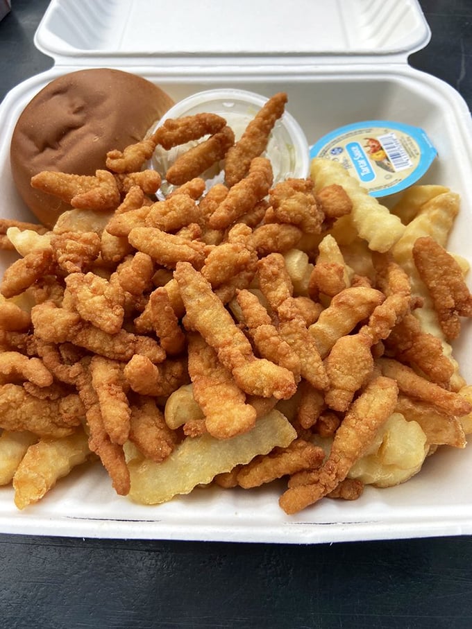 Fried clam strips that would make a New Englander weep with joy. Crispy, golden, and piled high—the way seafood was meant to be enjoyed.