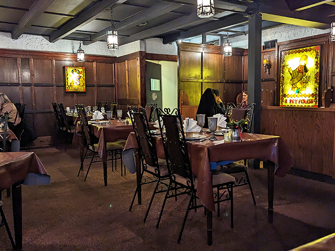 Tables spaced for privacy and comfort—because medieval feasting should include conversation without having to hear about your neighbor's knee surgery.