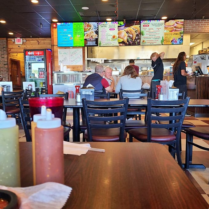 Fellow diners focused intently on their meals—the universal body language of "please don't talk to me until I've finished this amazing taco."