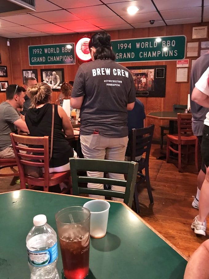 Those championship signs aren't just decoration—they're spoiler alerts for what's about to happen to your taste buds. The staff knows it too.