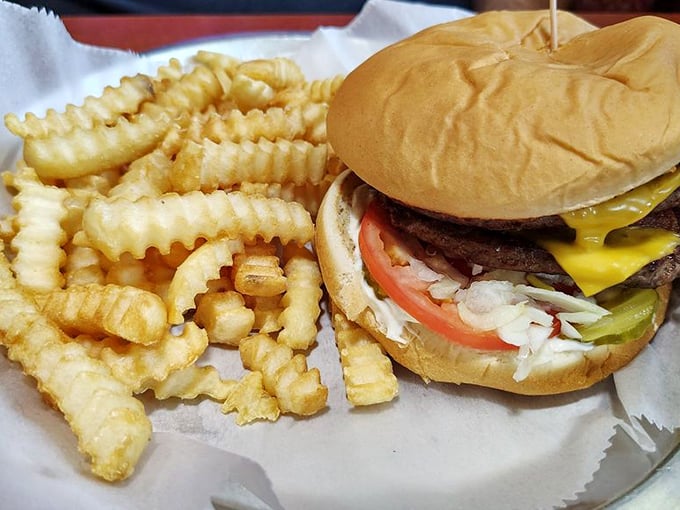 This isn't just a burger—it's a structural engineering marvel. Layer upon layer of beef, cheese, and fresh toppings create a skyscraper of satisfaction.