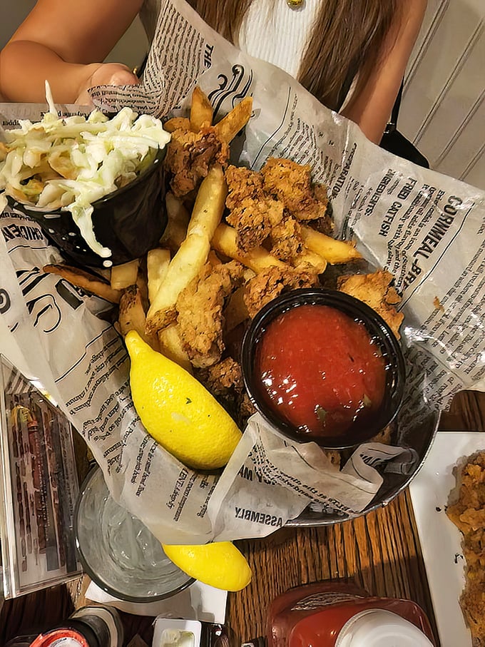 Fish and chips served with newspaper flair—crispy, flaky, and nostalgic enough to transport you to a seaside shack.