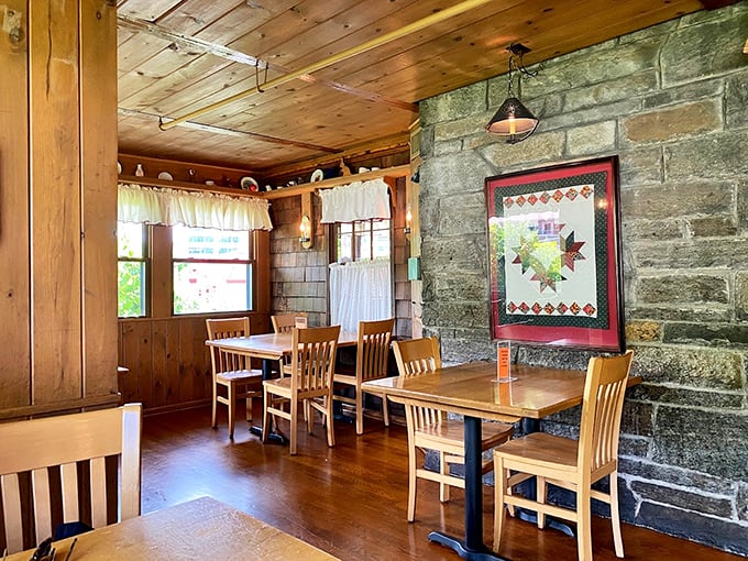 Stone walls and wooden beams create the perfect backdrop for conversations that linger as long as the taste of those biscuits.