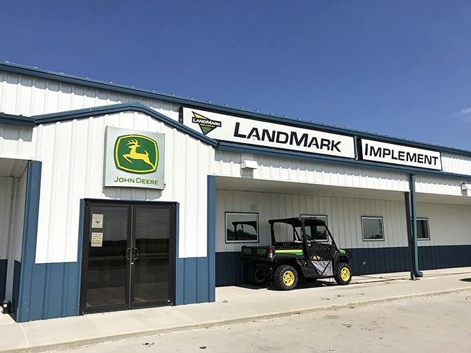LandMark Implement's clean lines and John Deere logo represent the backbone of Nebraska's economy, where farming isn't just work—it's heritage.
