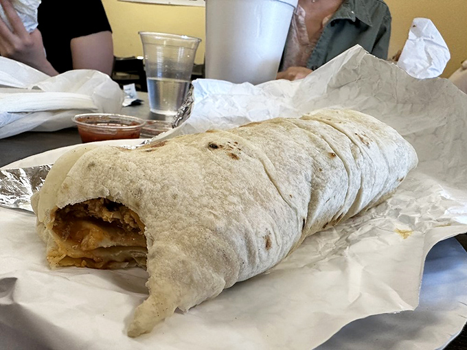 This burrito isn't just big—it's the size of your forearm and twice as powerful. Wrapped in a fresh tortilla that's the real star of the show.