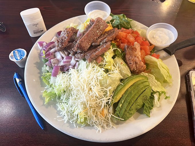A salad that even confirmed carnivores can love—perfectly cooked steak, fresh greens, and avocado in harmonious balance.
