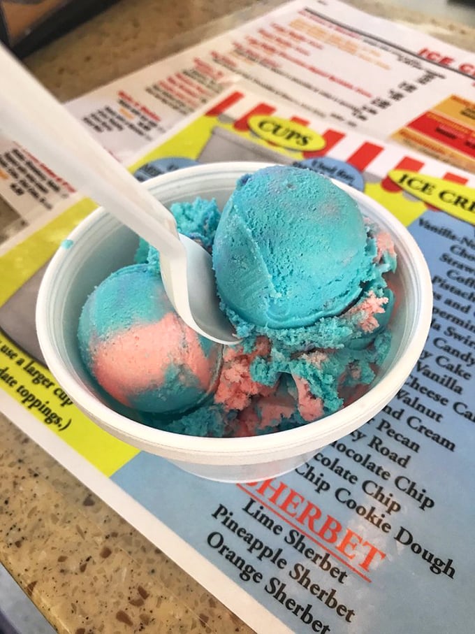 Blue and pink swirls creating a summer sunset in a cup. Superman ice cream doesn't just look magical—it tastes like childhood memories.